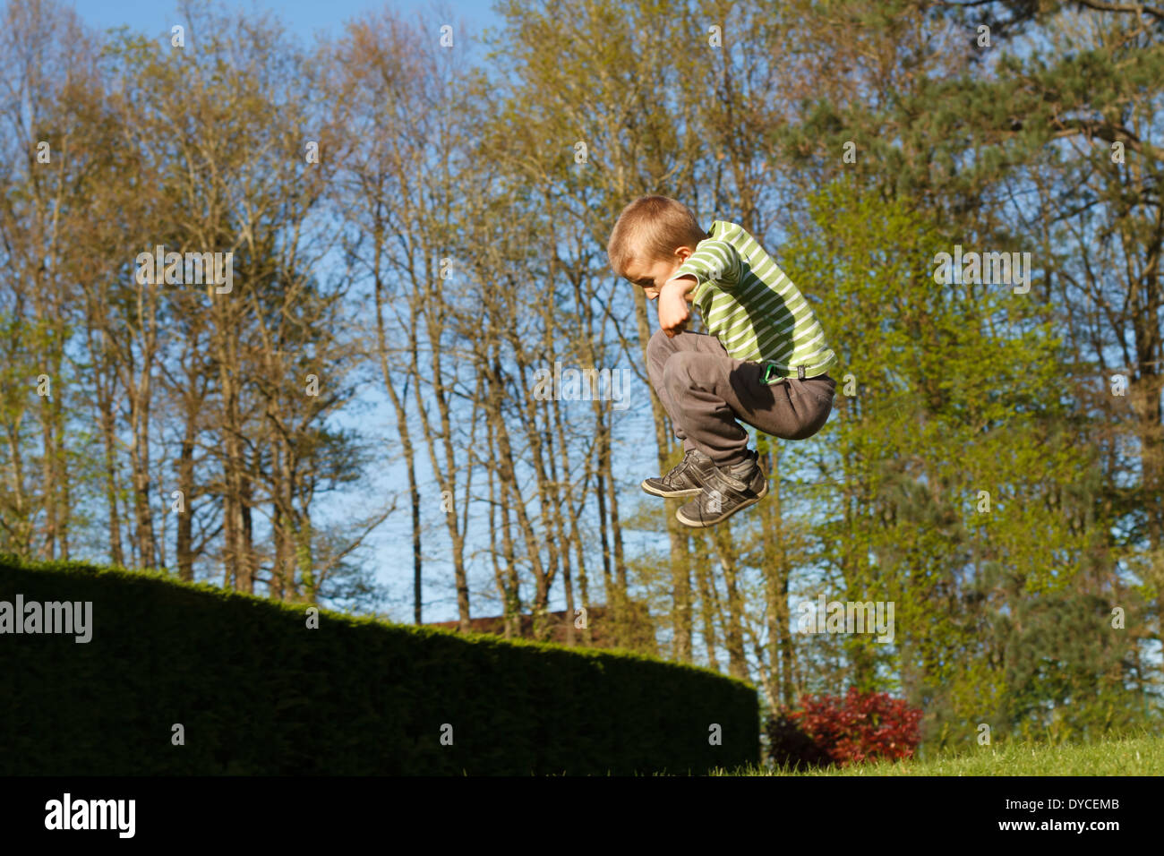 Boy 8 jumping hi-res stock photography and images - Alamy