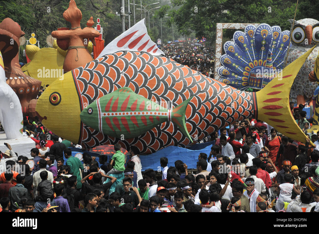 Dhaka, Bangladesh. 14th Apr, 2014. People participate in a rally to ...