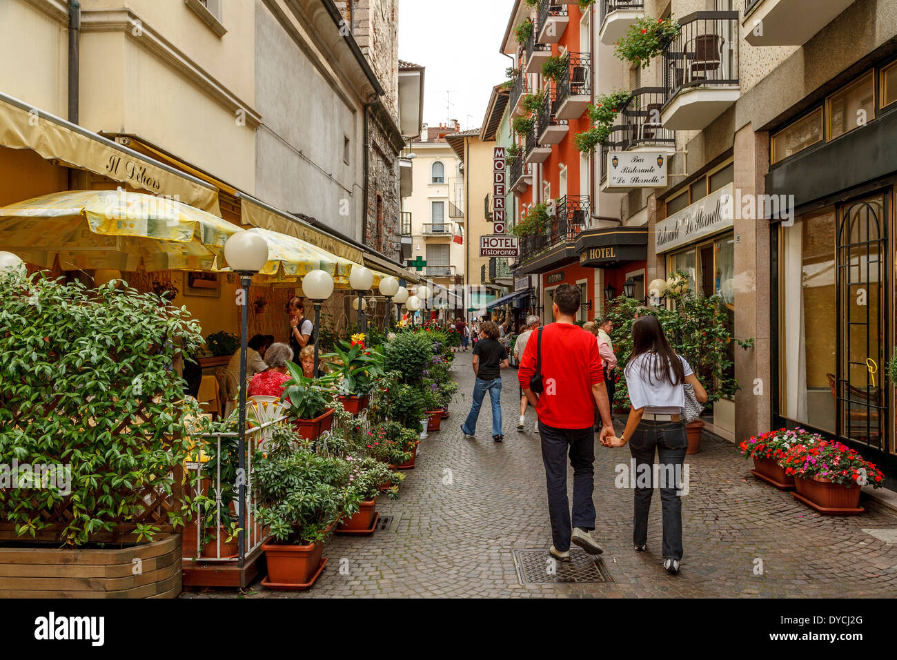 A Couple Walk Through the Streets Of Stresa, Lake Maggiore, Italy Stock ...