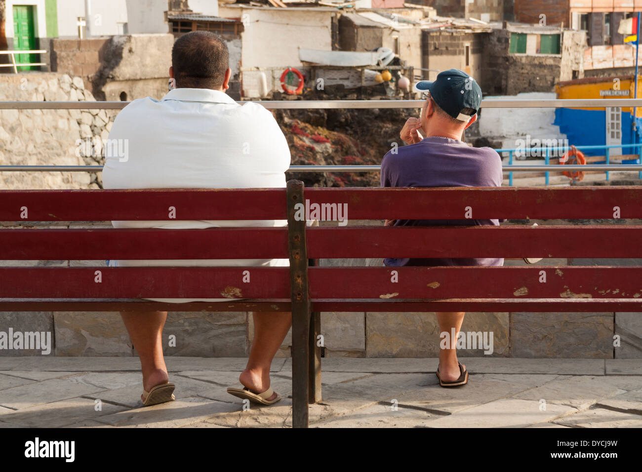 Fat man sitting on bench hi-res stock photography and images - Alamy