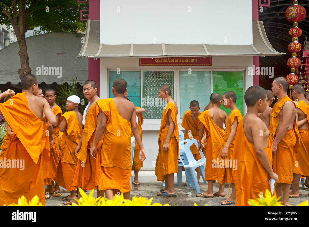 Bangkok, Thailand - Novices monks inside a temple or wat Stock Photo ...