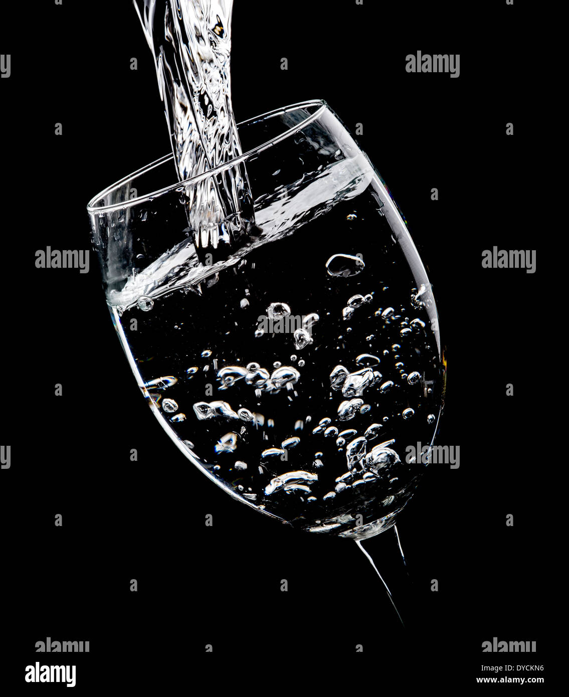 Water being poured into a glass Stock Photo - Alamy