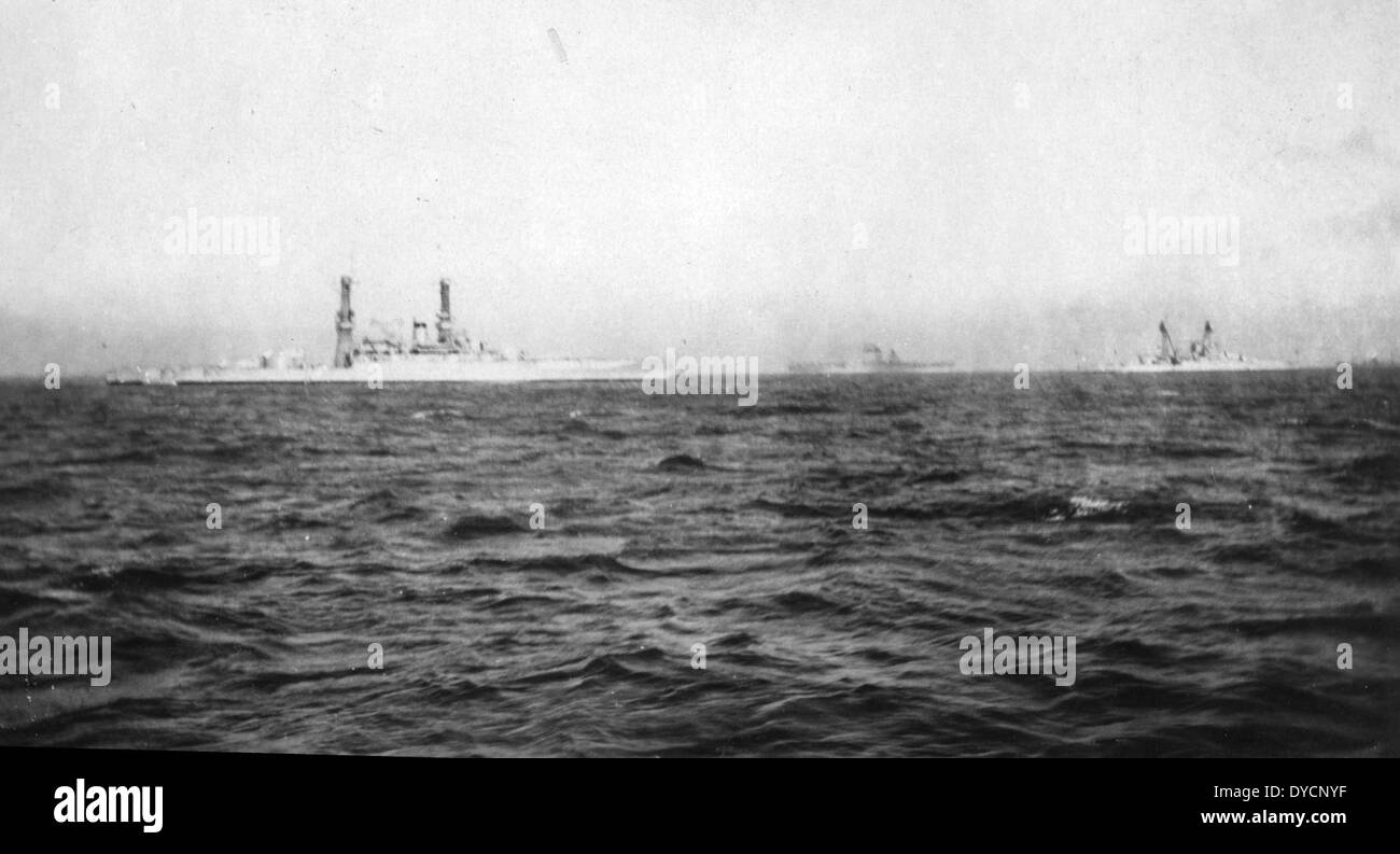 This photograph depicts the USS Tennessee (BB-43), a battleship of the ...