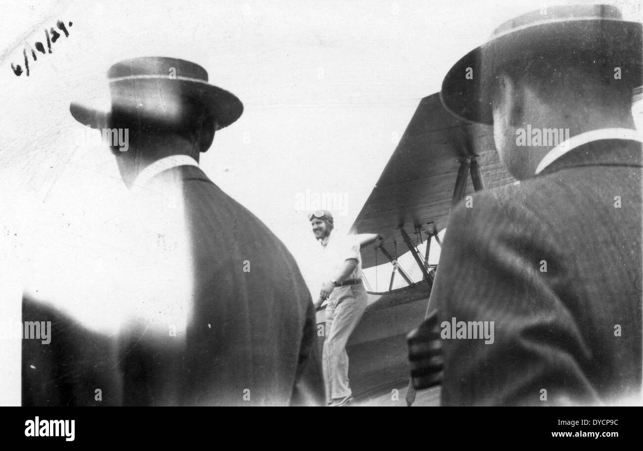 This photo shows Captain R.W. Mackie performing aerial stunts in a ...