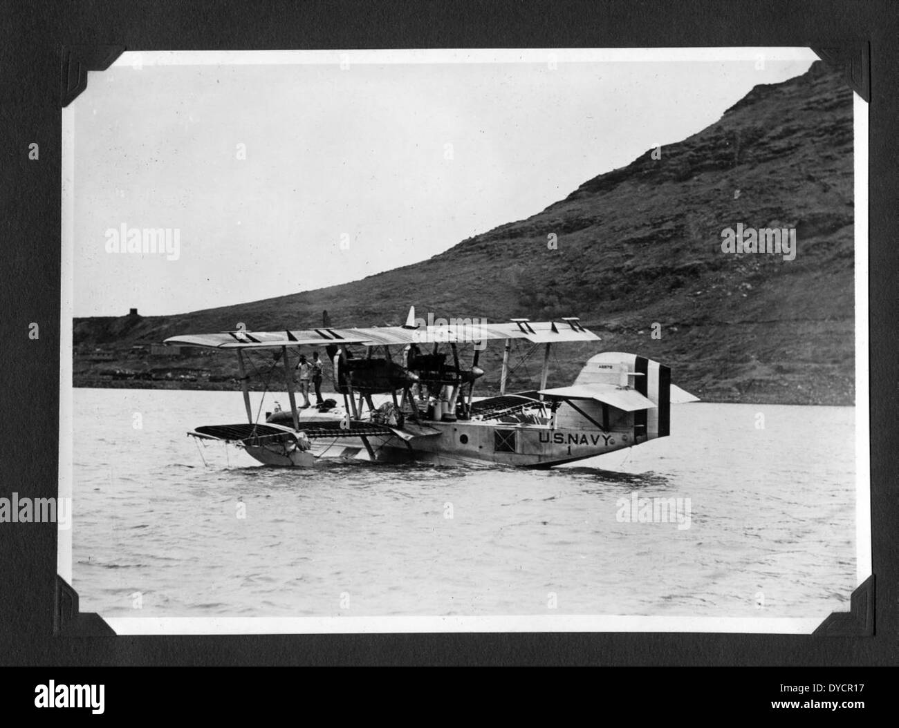 This image captures the Naval Aircraft Factory PN-9 flying over ...