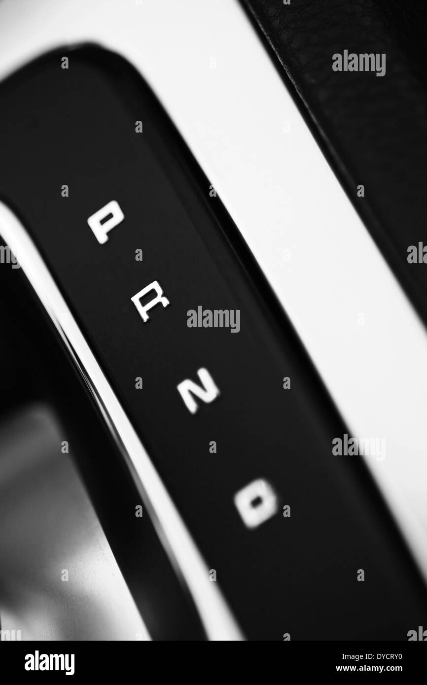 Close-up shot of the positions of an automatic gear shifter in a car ...