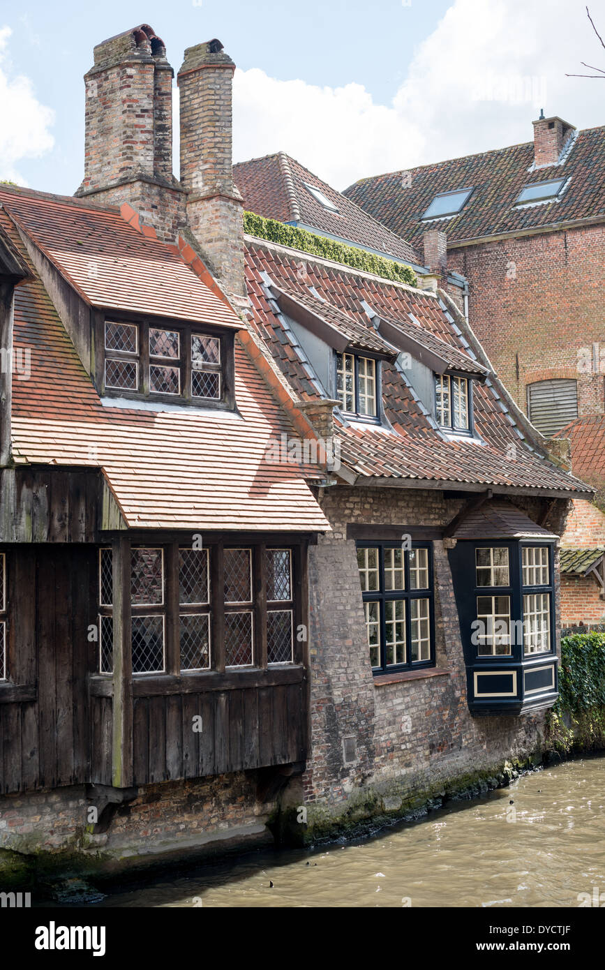 Medieval Canal Buildings Bruges Belgium // BRUGES, Belgium — Medieval buildings line one of the ...