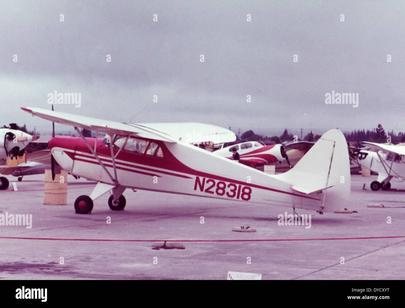 An image captured at an airshow, featuring an aircraft performing a ...