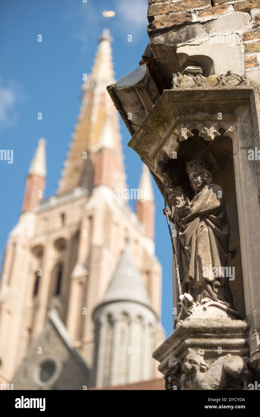 BRUGES, Belgium - A small ornamental sculpture on the exterior of Old ...