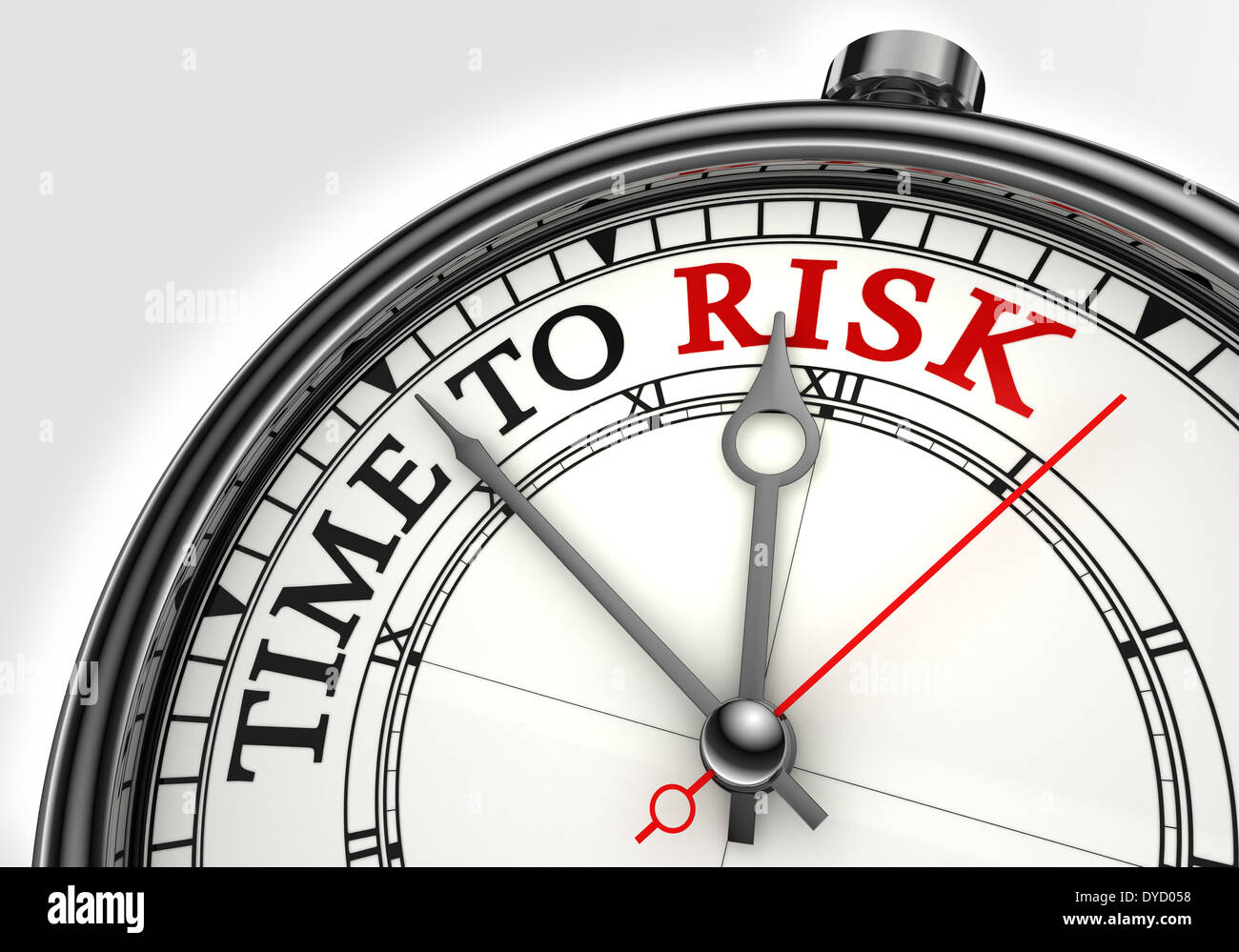 risk time concept clock closeup on white background with red and black ...