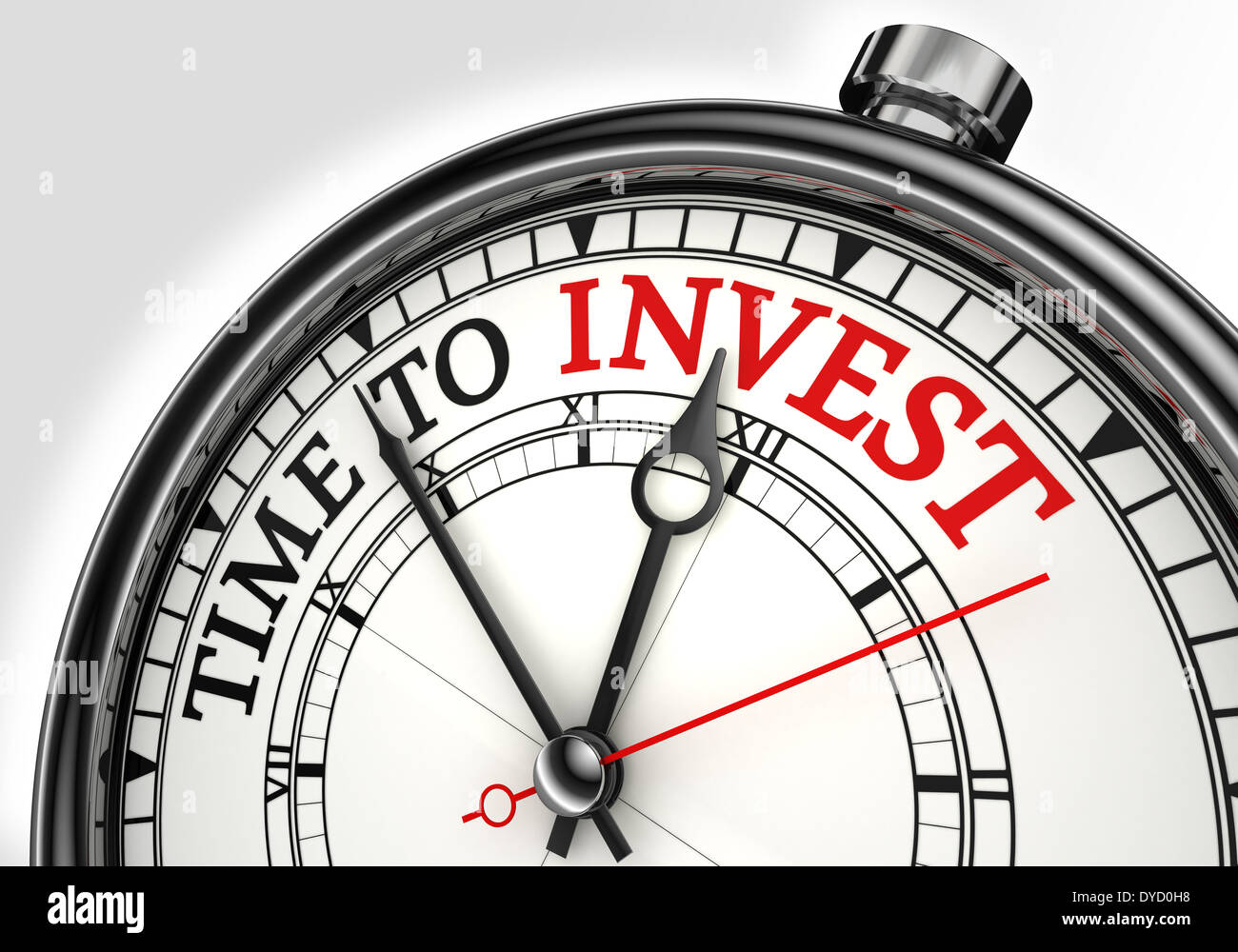 time to invest concept clock closeup on white background with red and ...