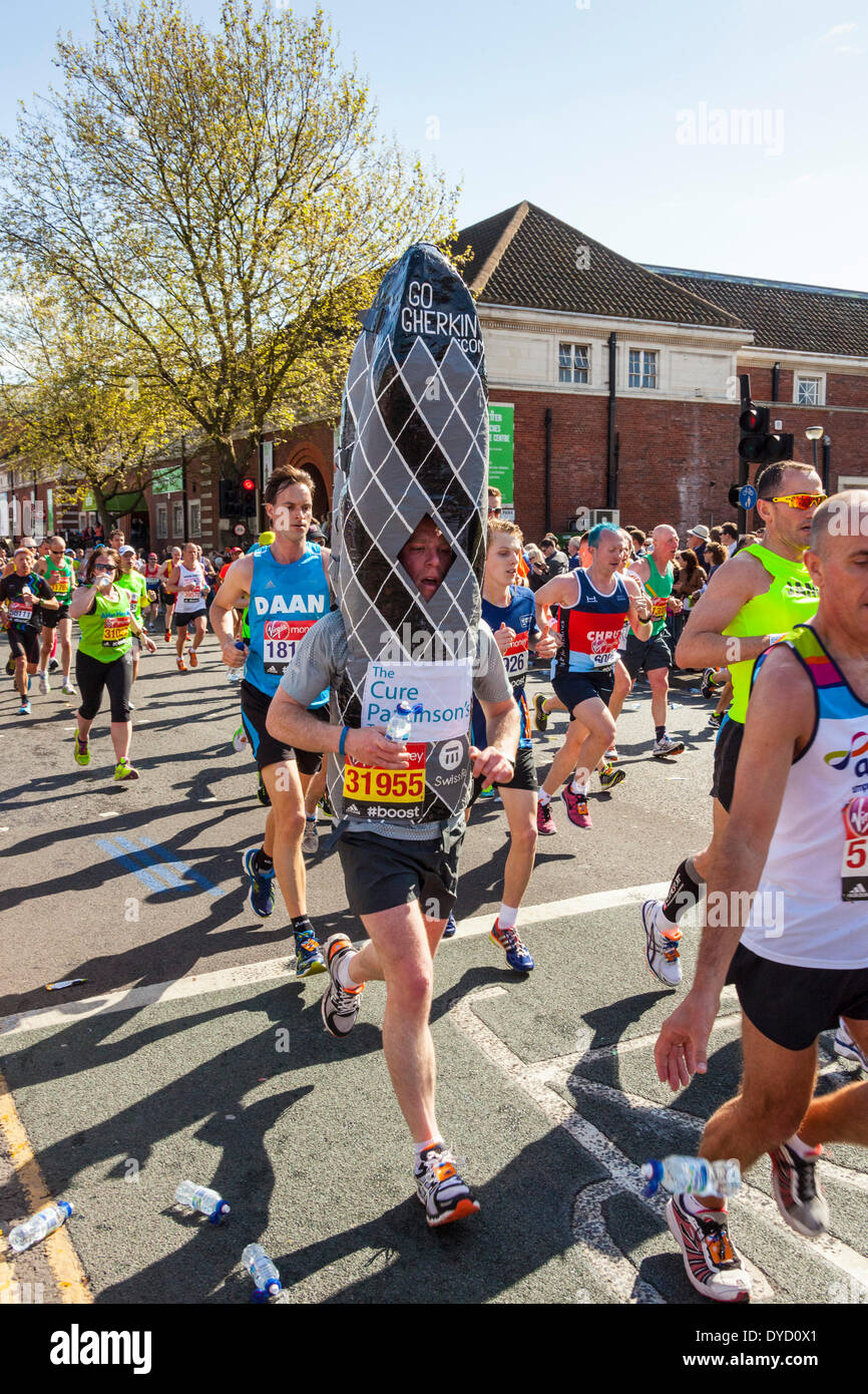 London UK. 13 April 2014 London Virgin Money Marathon including runner ...