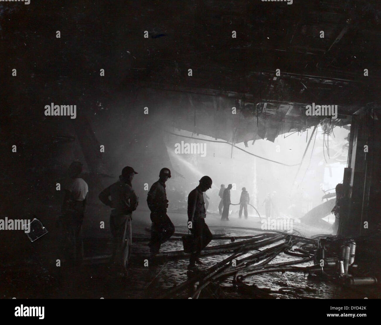 The USS Bunker Hill (CV-17), an Essex-class aircraft carrier, suffered ...