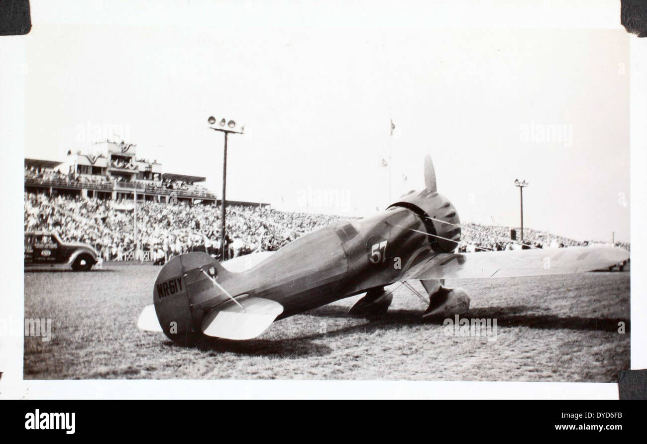 This photo features the winner of the Thompson Trophy, aircraft #57 ...