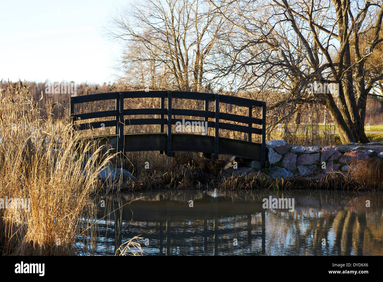 Autumn wooden bridge scenery Stock Photo - Alamy