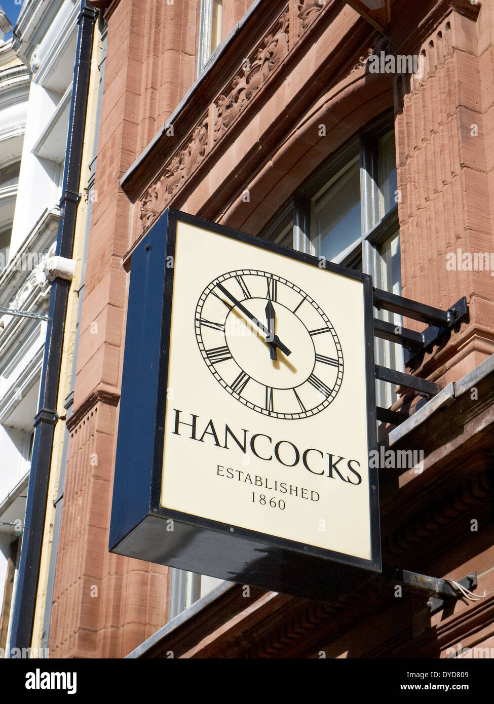 Hancocks, jeweller, clock on outside wall in King Street Manchester UK ...