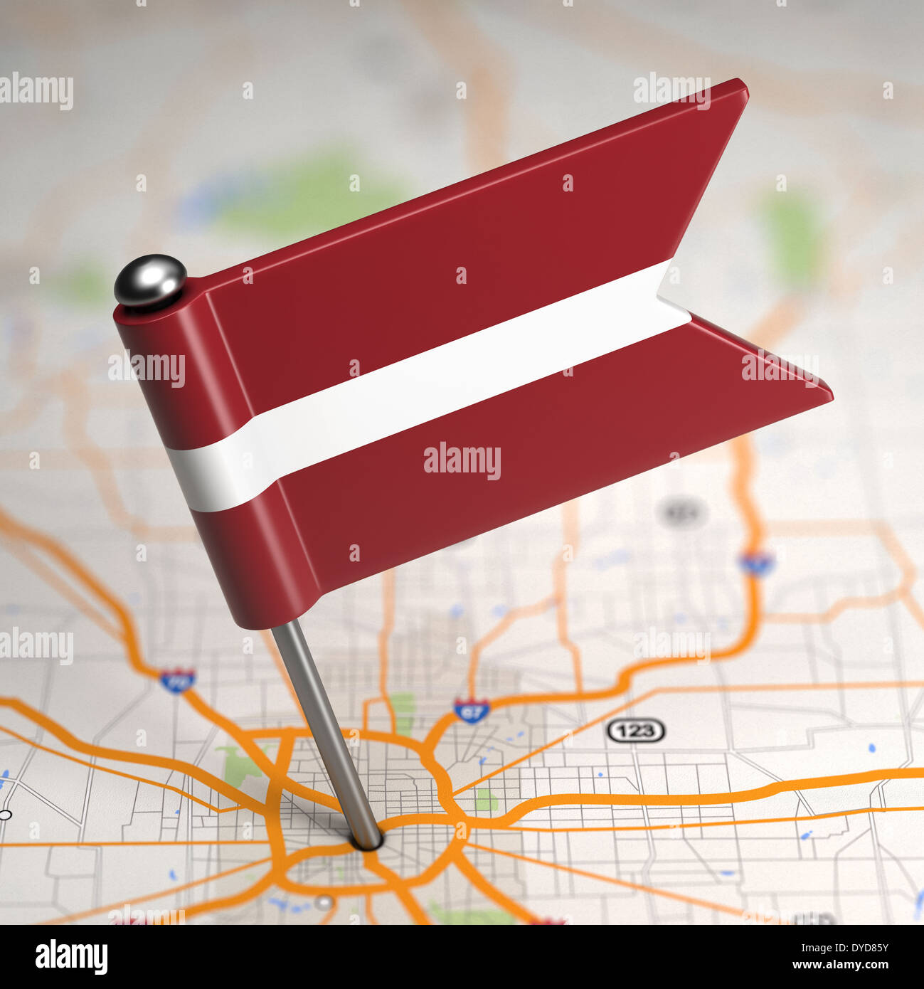 Small Flag of Latvia Sticked in the Map Background with Selective Focus ...