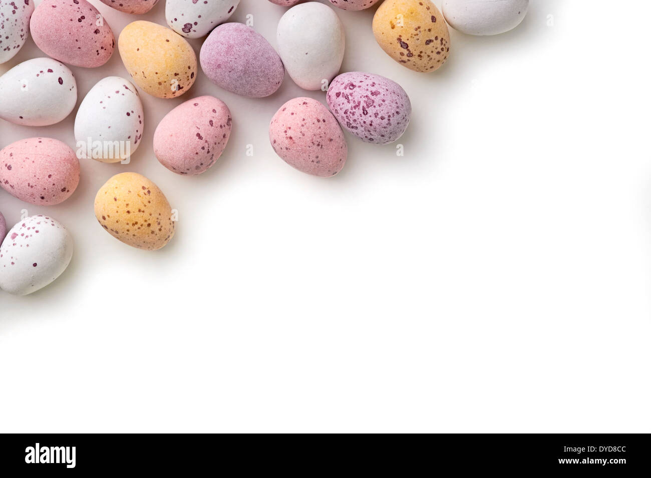 A selection of chocolate Easter Eggs with a candy crunchy shell on a ...