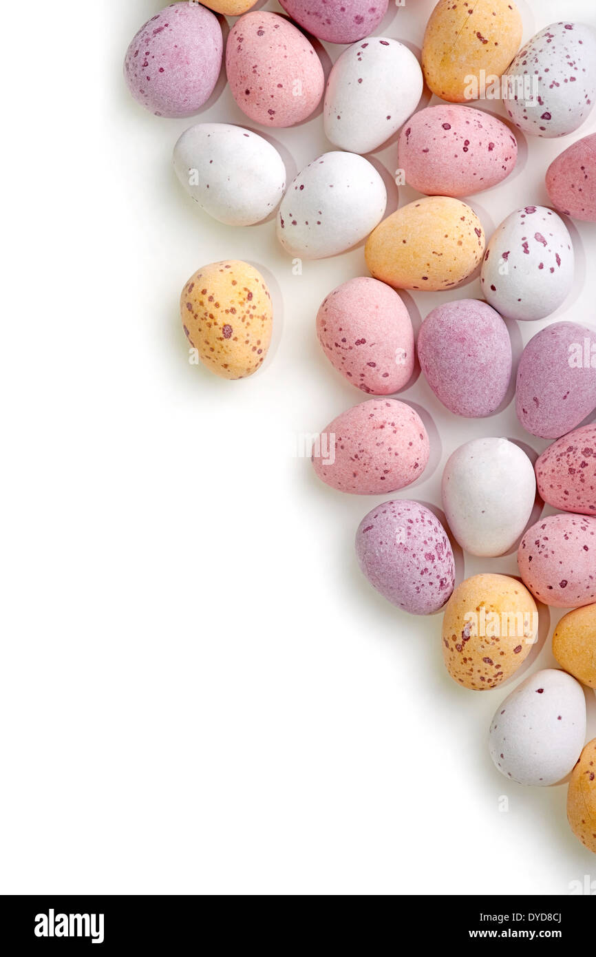 A selection of chocolate Easter Eggs with a candy crunchy shell on a ...