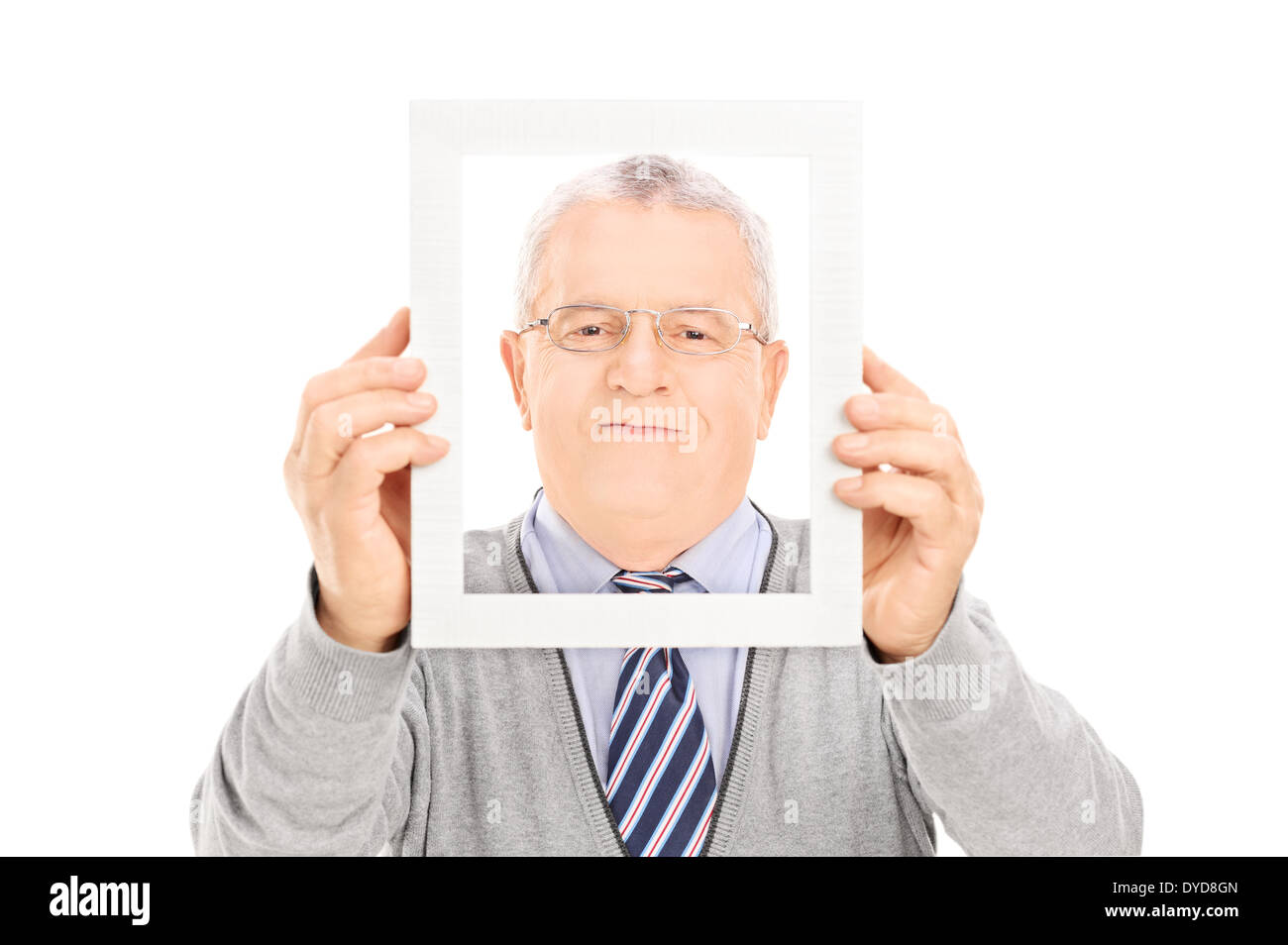 Senior man posing with frame in front of his face Stock Photo - Alamy