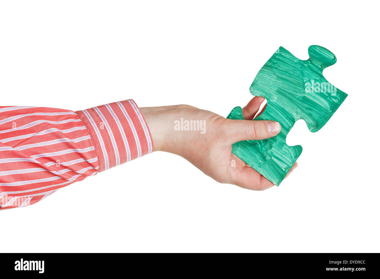 male hand with painted green puzzle piece isolated on white background ...