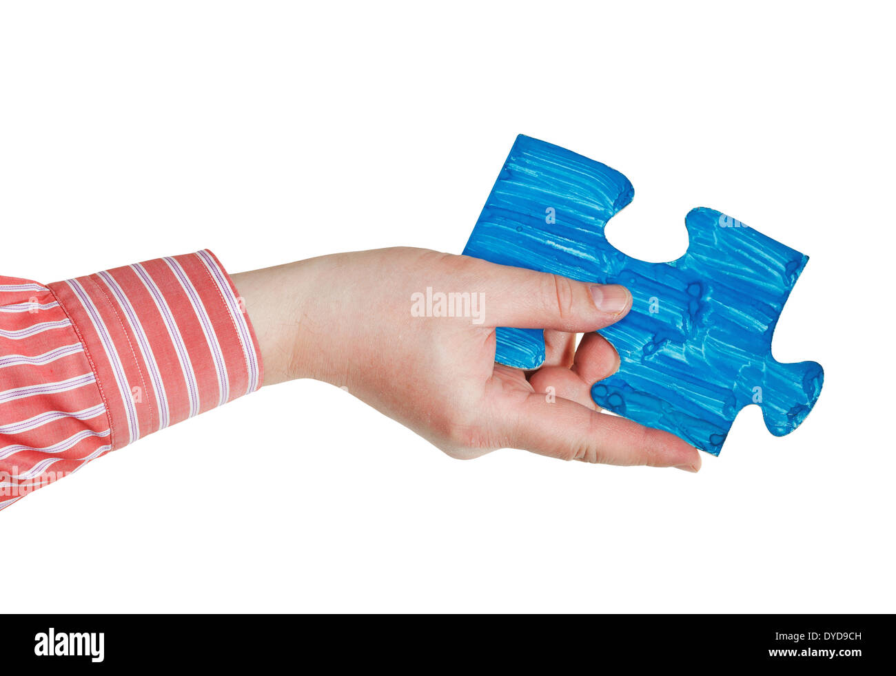male hand with painted blue puzzle piece isolated on white background ...
