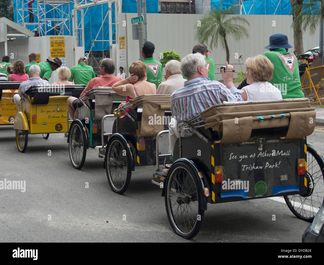 Western tourists in rickshaws in downtown Singapore Stock Photo - Alamy