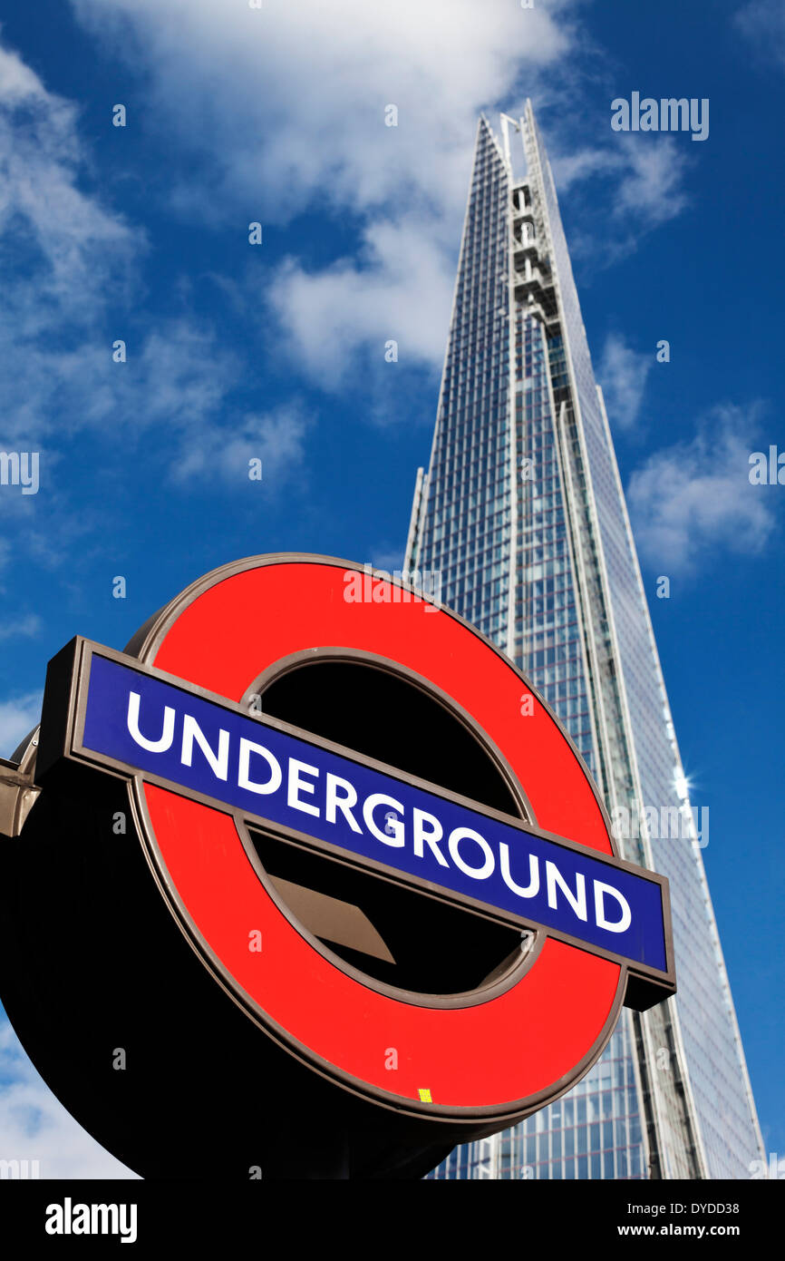 A London Underground sign and The Shard Stock Photo - Alamy