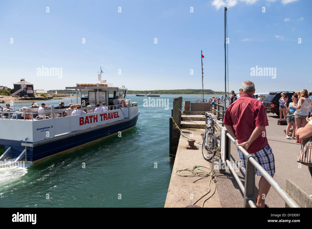 Mudeford to Hengistbury Head ferry arriving at the quay Stock Photo - Alamy