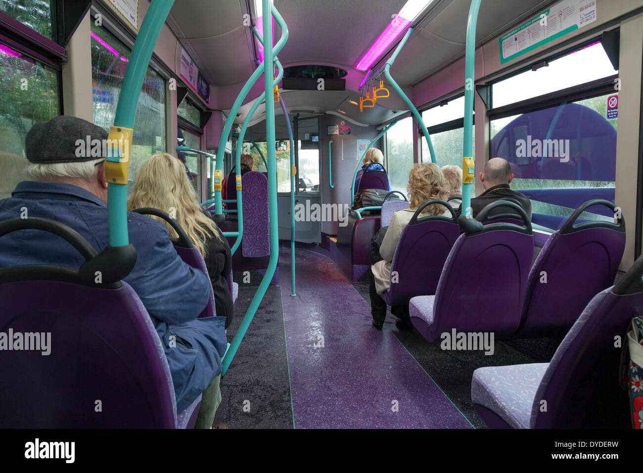 Passengers on single decker public bus Stock Photo - Alamy