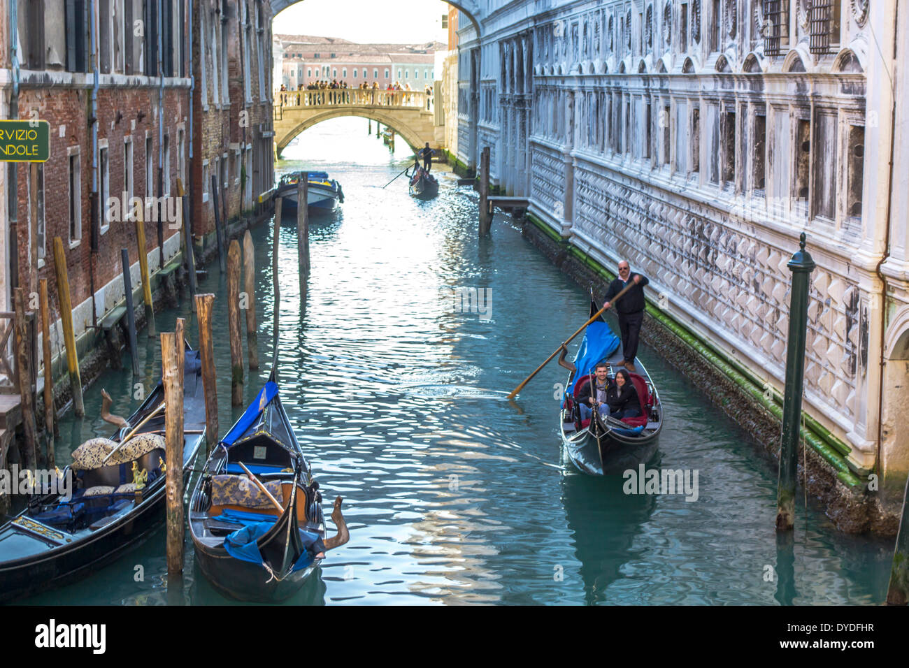 A couple on a gondola ride in Venice Stock Photo - Alamy