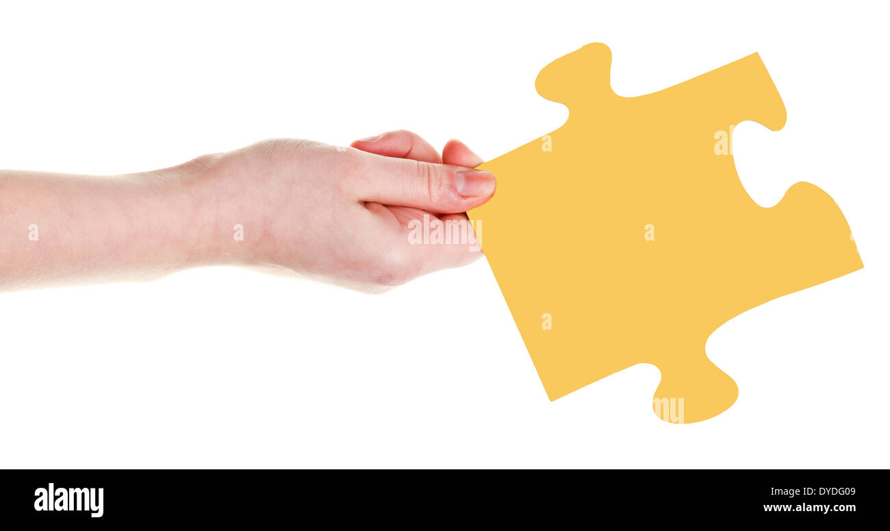 female hand with yellow puzzle piece isolated on white background Stock ...