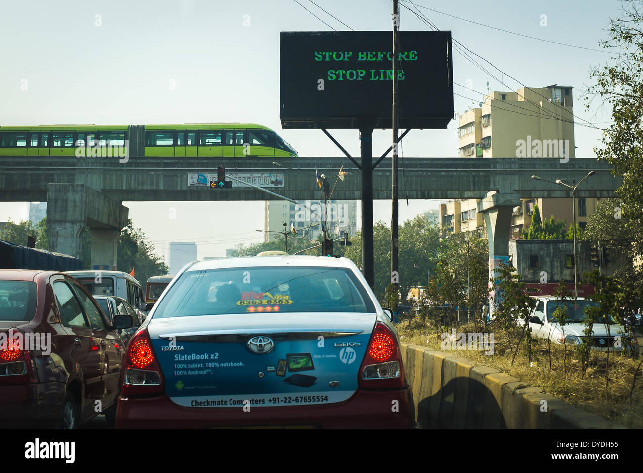 A monorail undergoing safety trials over a busy road junction Stock ...