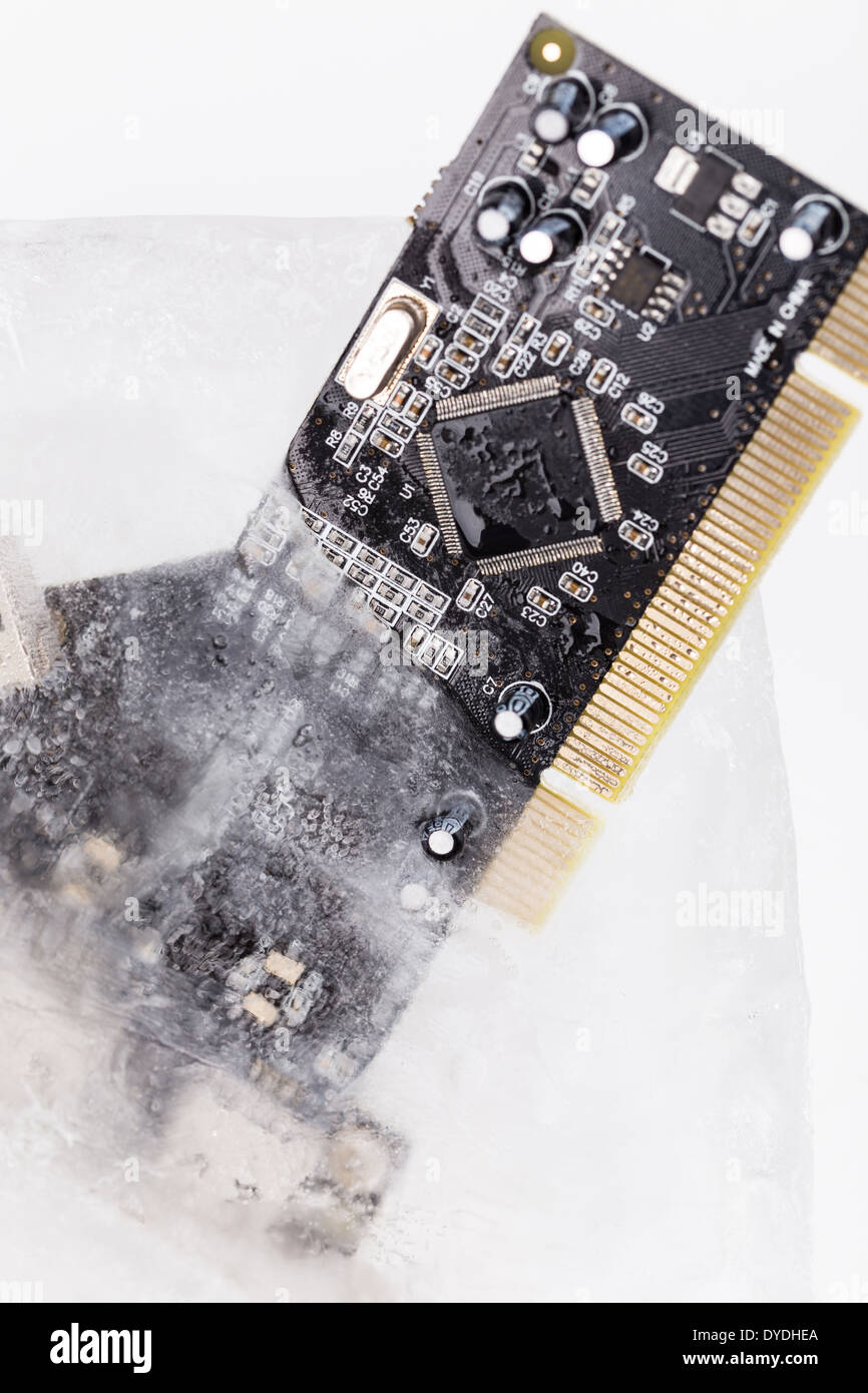 frozen electonics board for computer in ice Stock Photo - Alamy