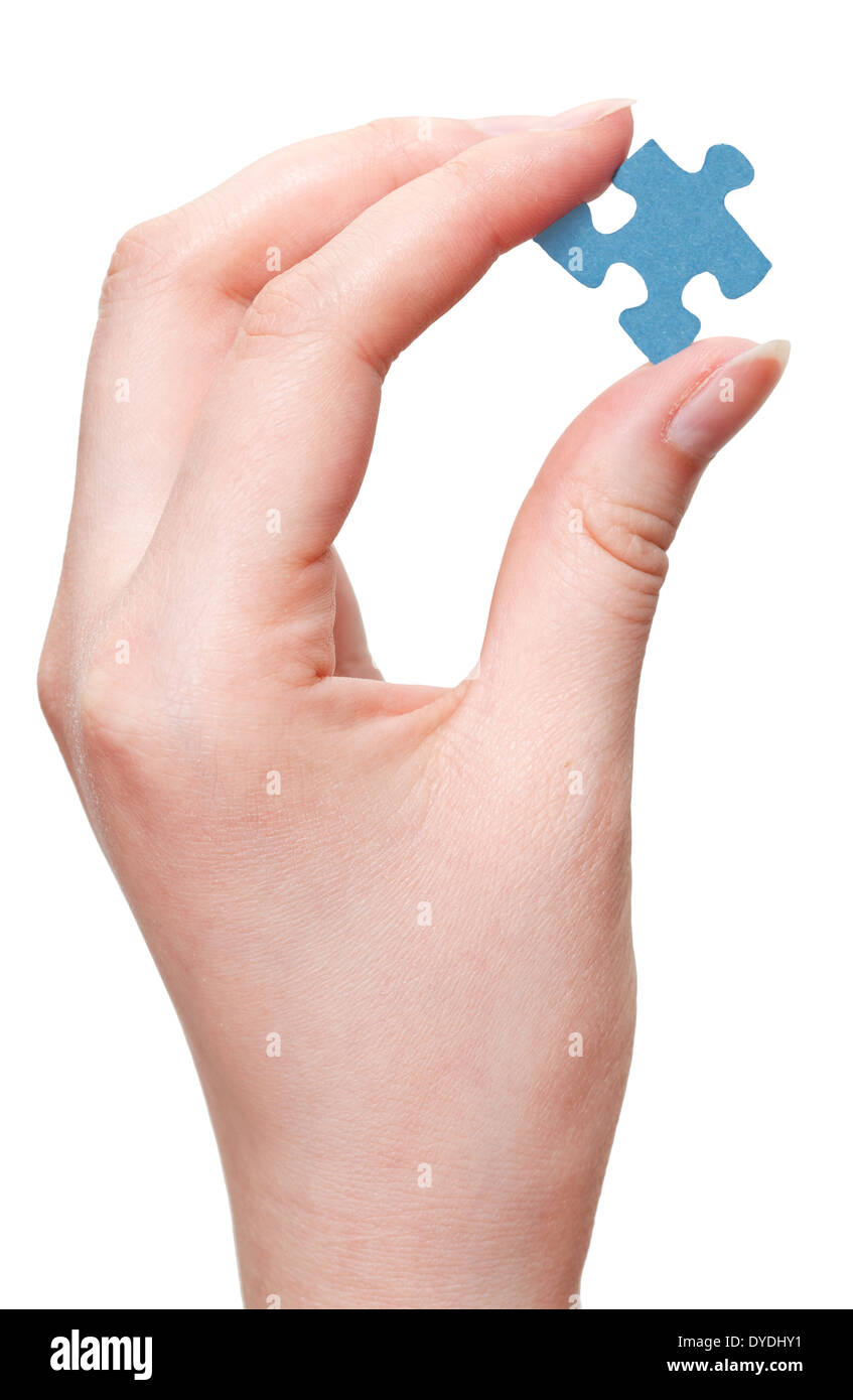 female arm holding blue puzzle piece isolated on white background Stock ...
