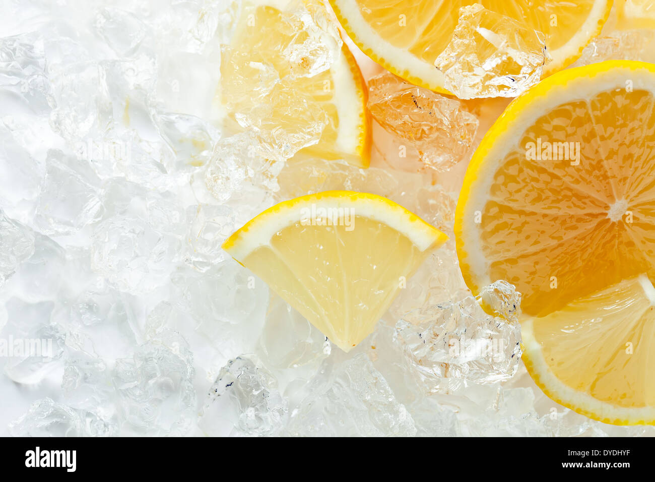 slices of lemon with ice Stock Photo - Alamy