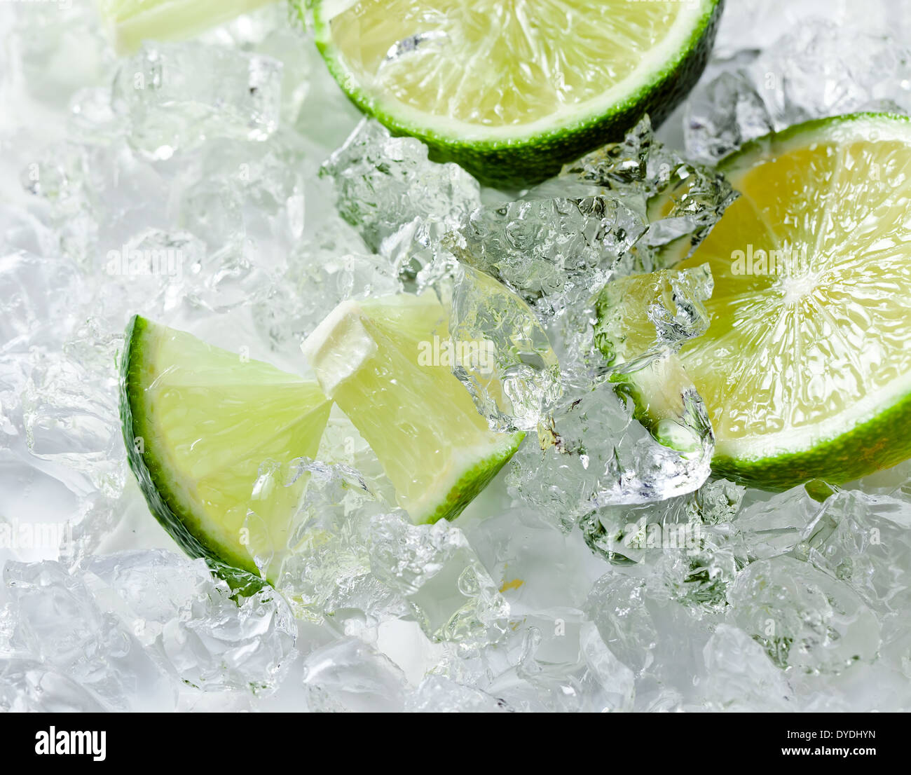 slices of lime with ice Stock Photo - Alamy