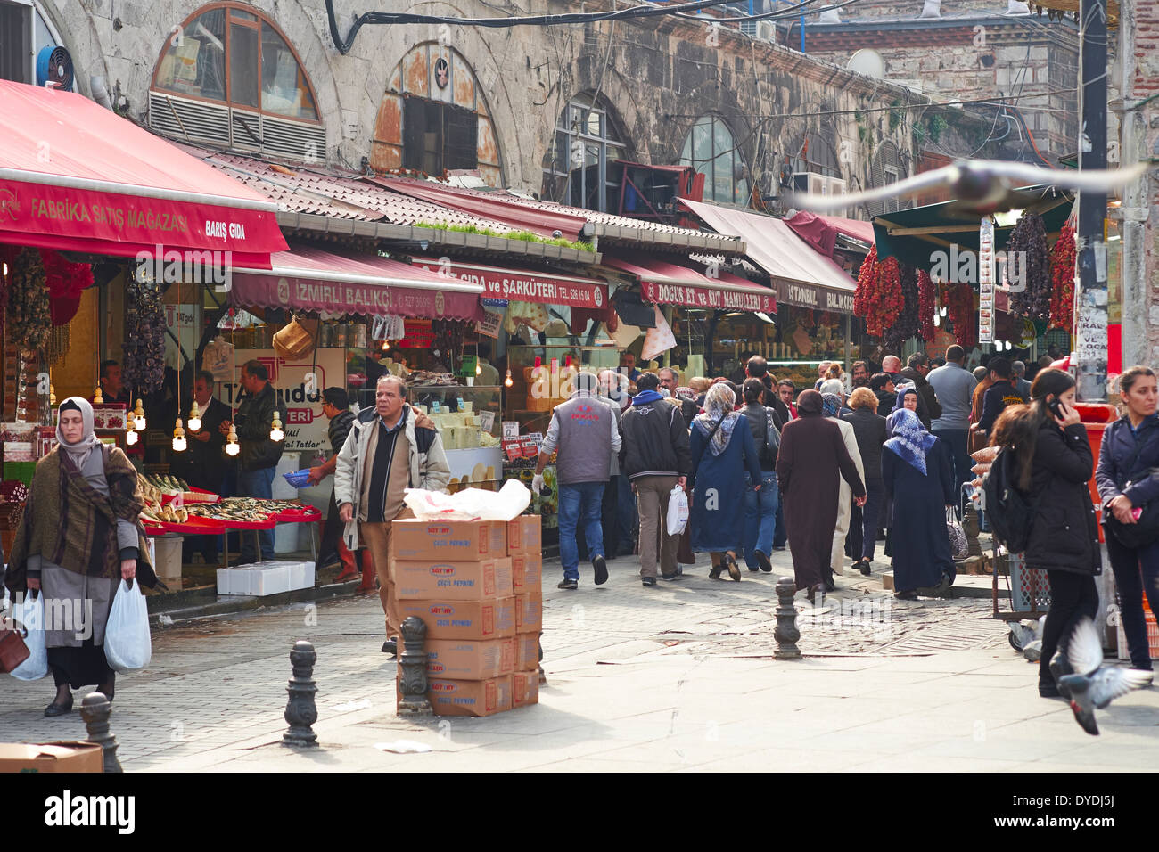 Tourists and locals shopping at one of the open markets in, Istanbul ...