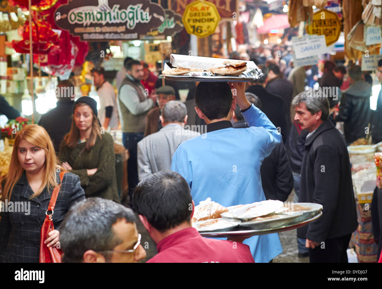 Tourists and locals shopping at one of the open markets in, Istanbul ...