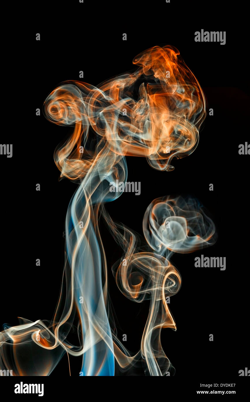 color abstract smoke isolated black background Stock Photo - Alamy
