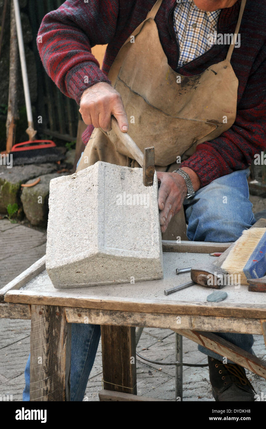Stonemason. Hands detail of craftsman at work Stock Photo - Alamy