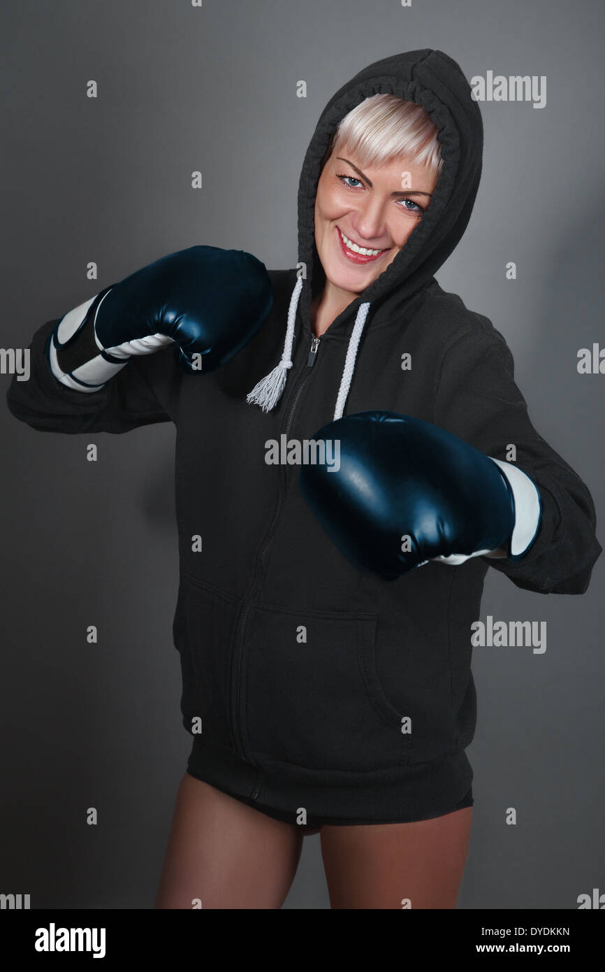 Girl boxing gloves smiling hi-res stock photography and images - Alamy