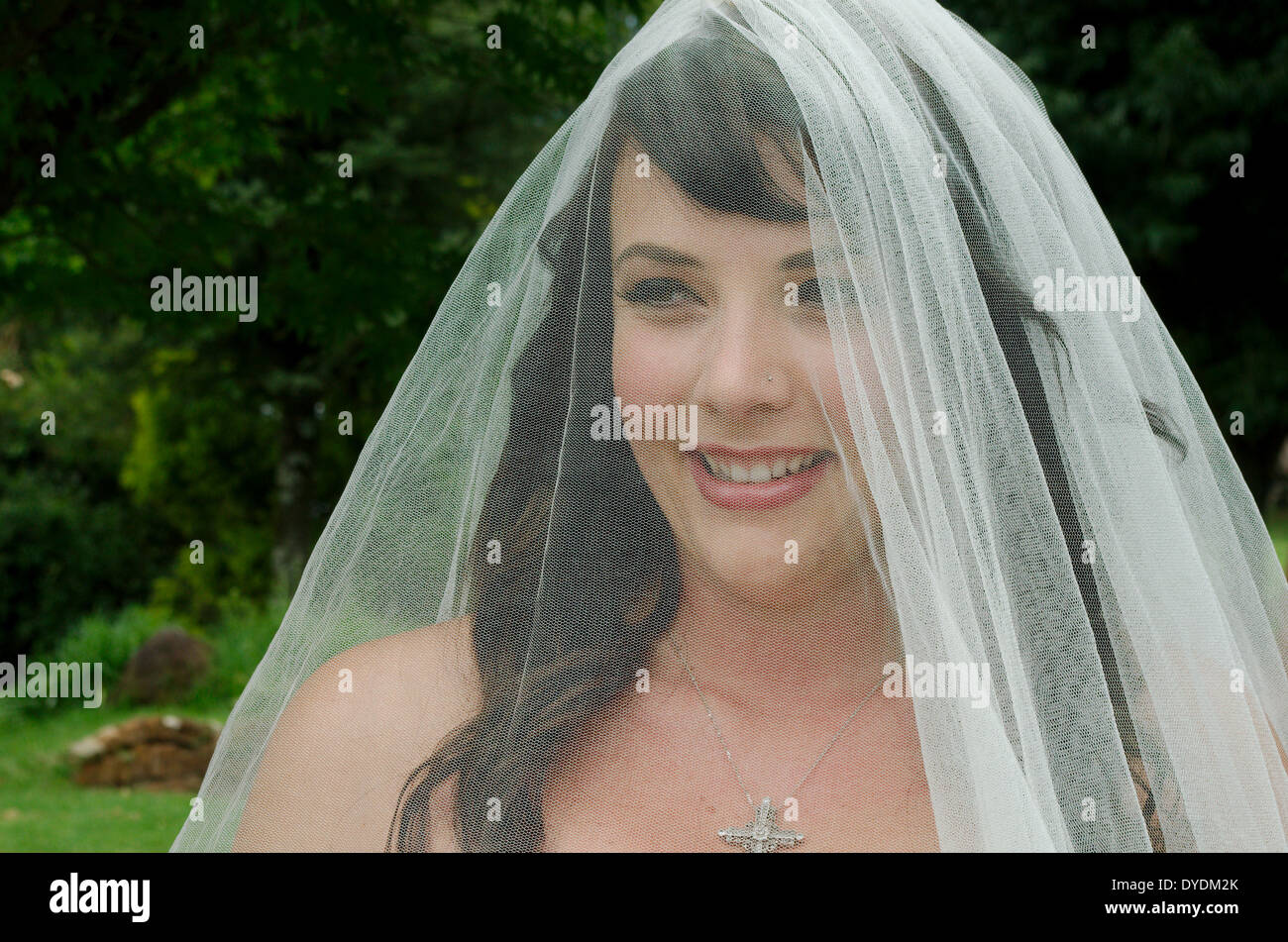 Beautiful South African bride outside church on way to wedding Stock ...