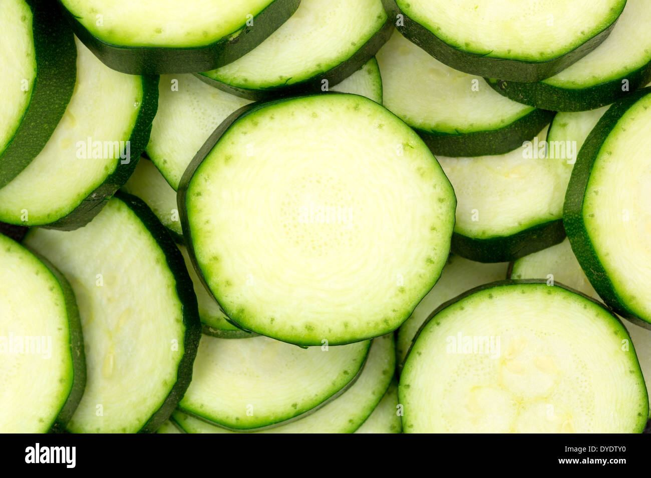 A very close view of several slices of summer squash Stock Photo - Alamy