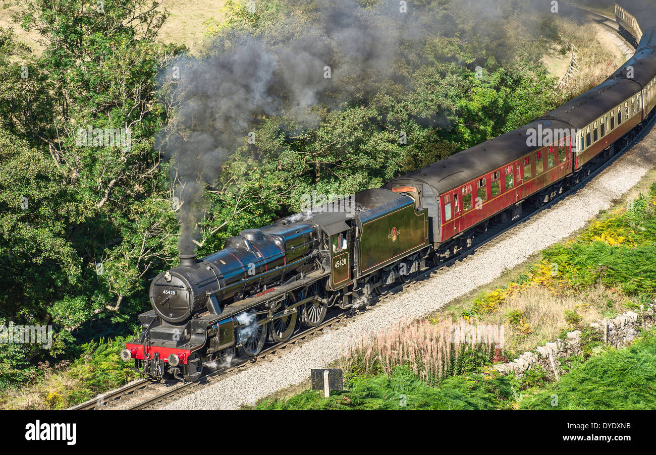 Vintage steam train makes its way through the North York Moors on a ...