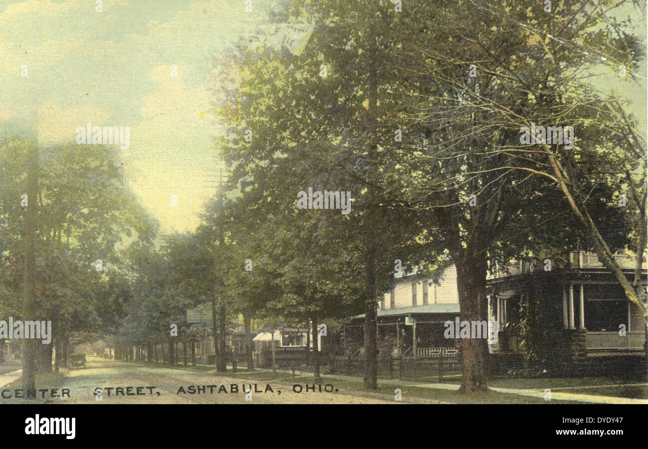 This historic photograph of Center Street in Ashtabula, Ohio, shows a ...