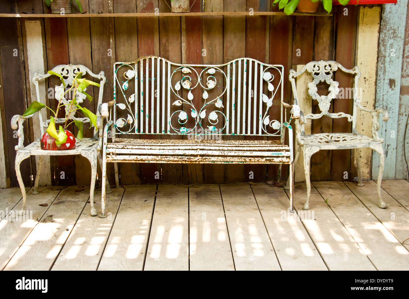 old rusty metal vintage bench and chair Stock Photo - Alamy
