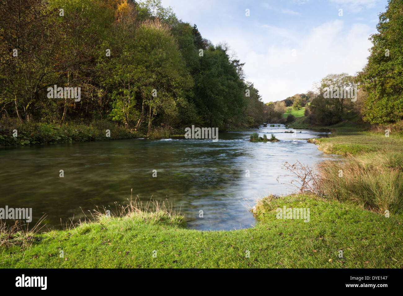 The crystal-clear waters of the River Lathkill flow through Lathkill ...