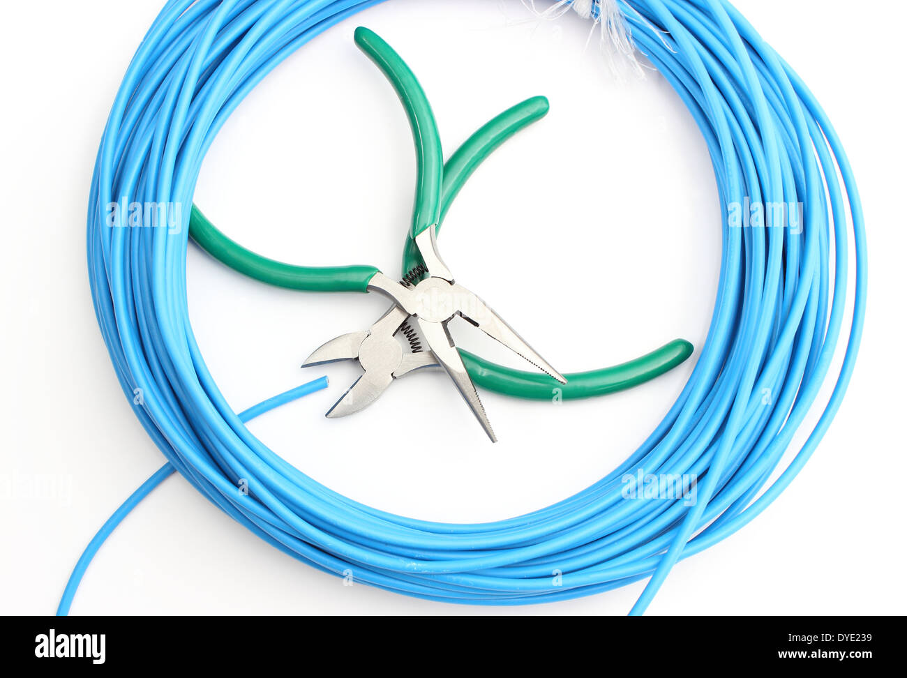 Metal tools with blue cable on white background Stock Photo - Alamy