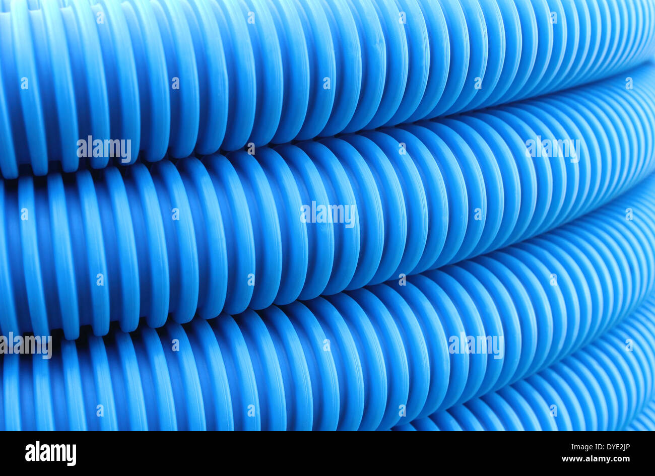Blue plastic corrugated pipe Stock Photo - Alamy